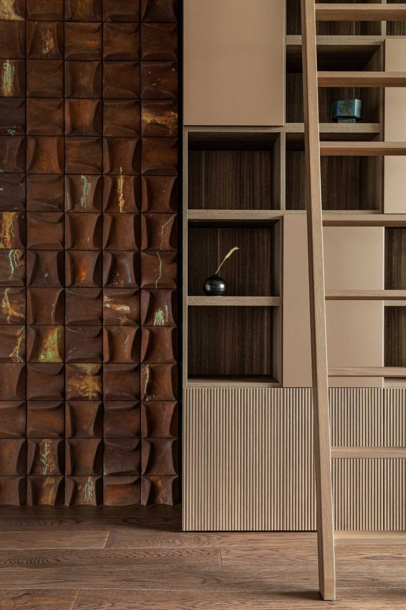 A Curved Accent Wall Wraps Around From The Fireplace To The Ceiling ...