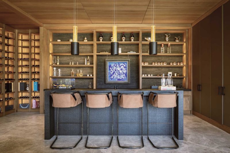 LED Lighting Illuminates Shelving Throughout This Home's Interior