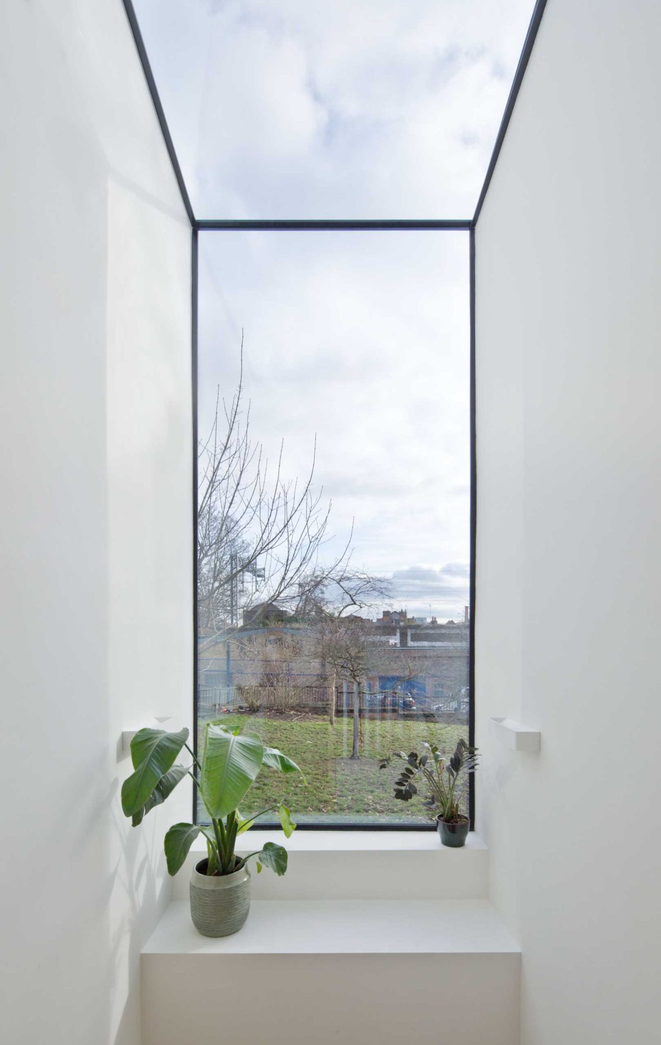 Pivoting Arched Windows Are A Unique Feature On This Row Of Townhouses ...