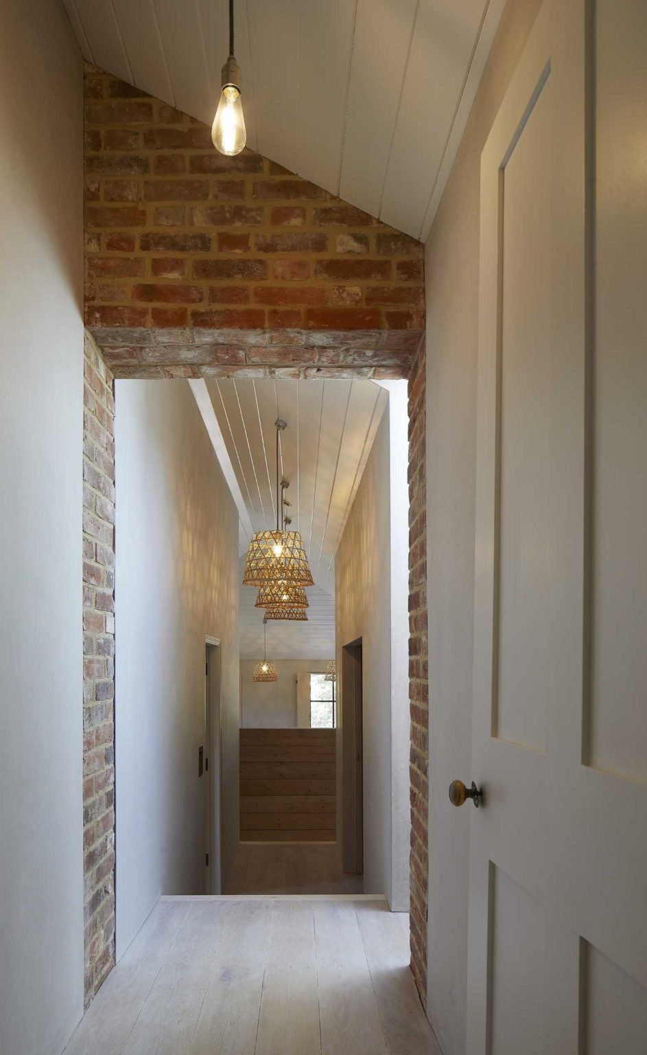 A Modern Addition For An 1830s Brick Farm House