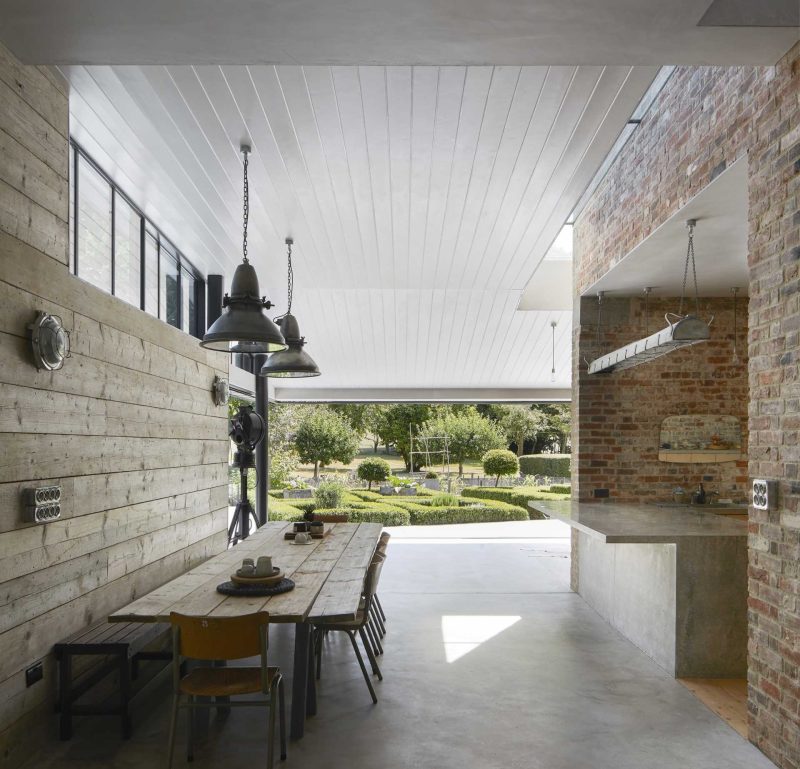 A Modern Addition For An 1830s Brick Farm House