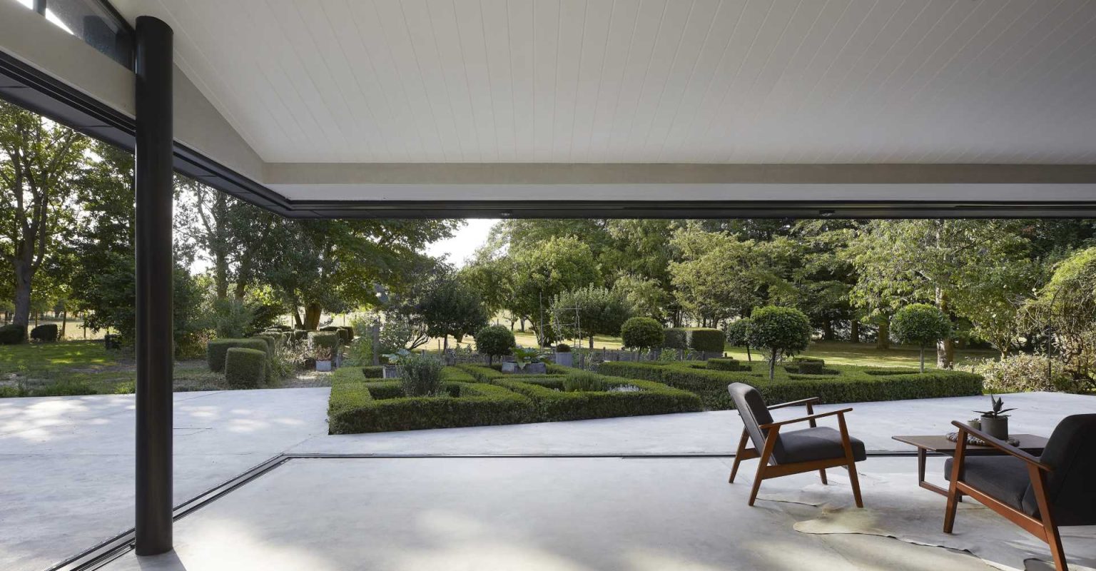 A Modern Addition For An 1830s Brick Farm House