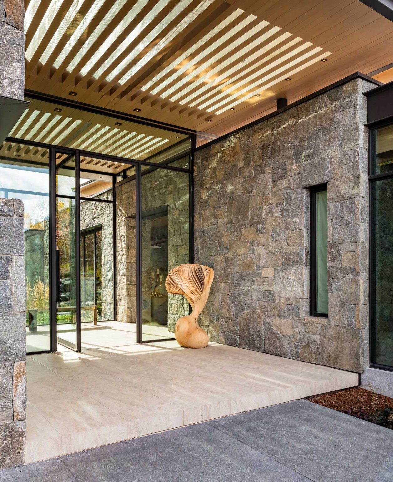 Clad In Stone, Wood, Steel, And Glass, This House Nestles Quietly ...
