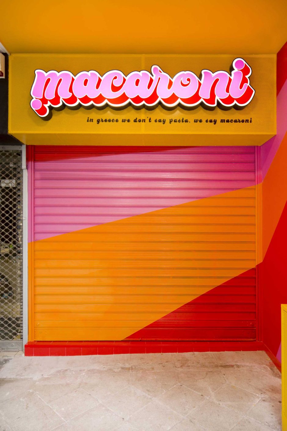 A Boldly Colored Pasta Shop Brightens Up The Street In Athens