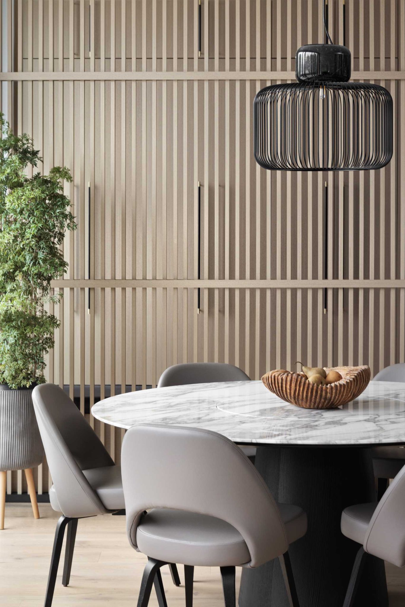 Metal Cladding Wraps Around The Large Gable Roof Of This House