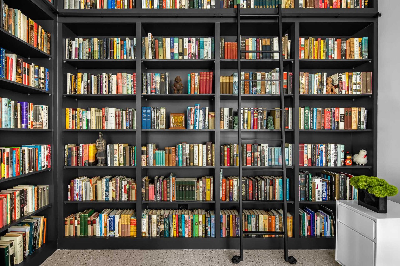 A Glass-Enclosed Library And Home Office Creates A Separate Space ...