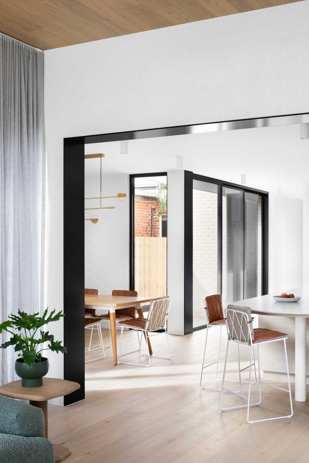 A Curved Corner Softens The Space Inside This Home Extension