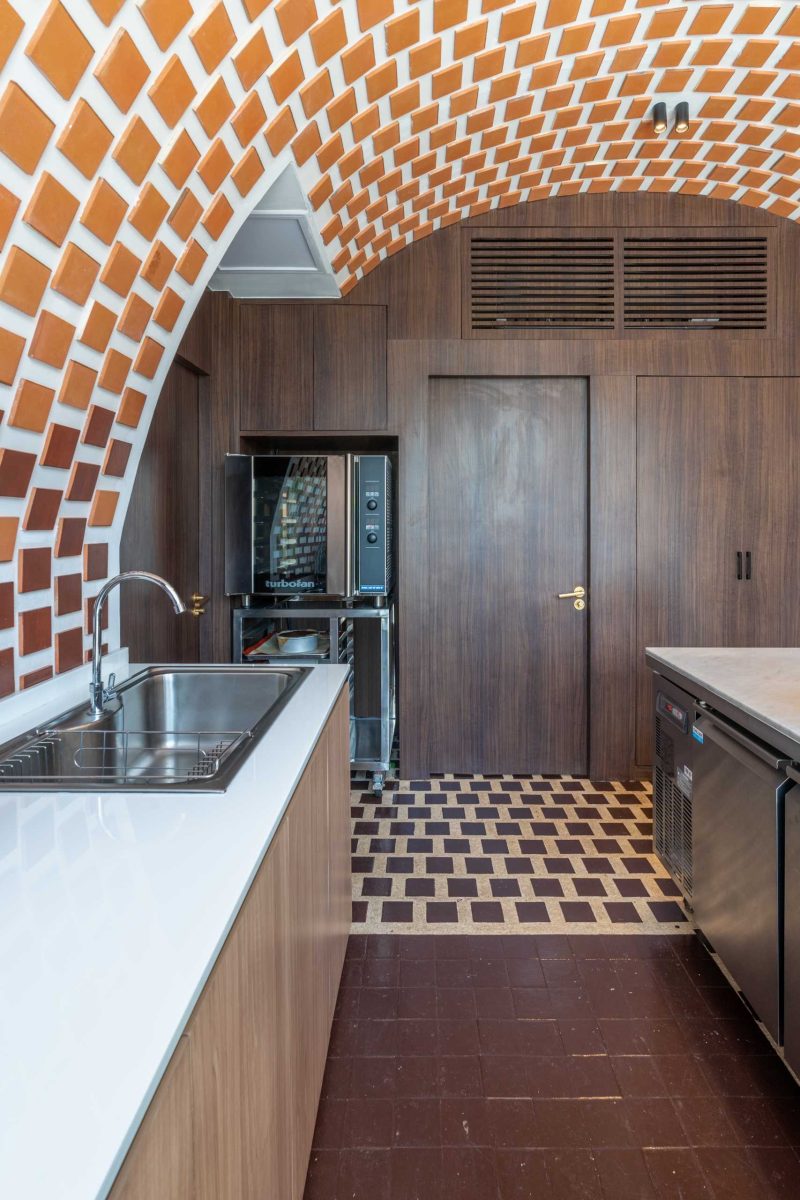 The Large Arch Window In Front Of This Cafe Offers A Glimpse Of The ...