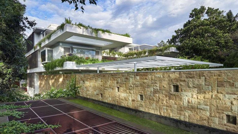 Overhanging Plants Surround The Exterior Of This Home