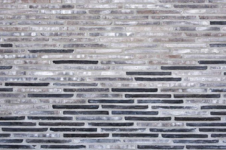 Handmade Elongated Bricks Cover The Exterior Of This Home