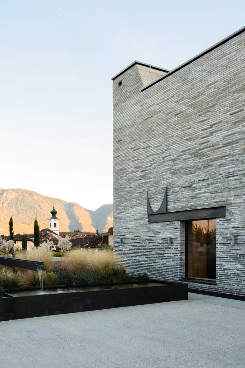 Handmade Elongated Bricks Cover The Exterior Of This Home