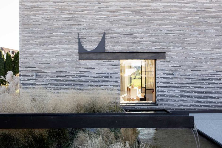 Handmade Elongated Bricks Cover The Exterior Of This Home