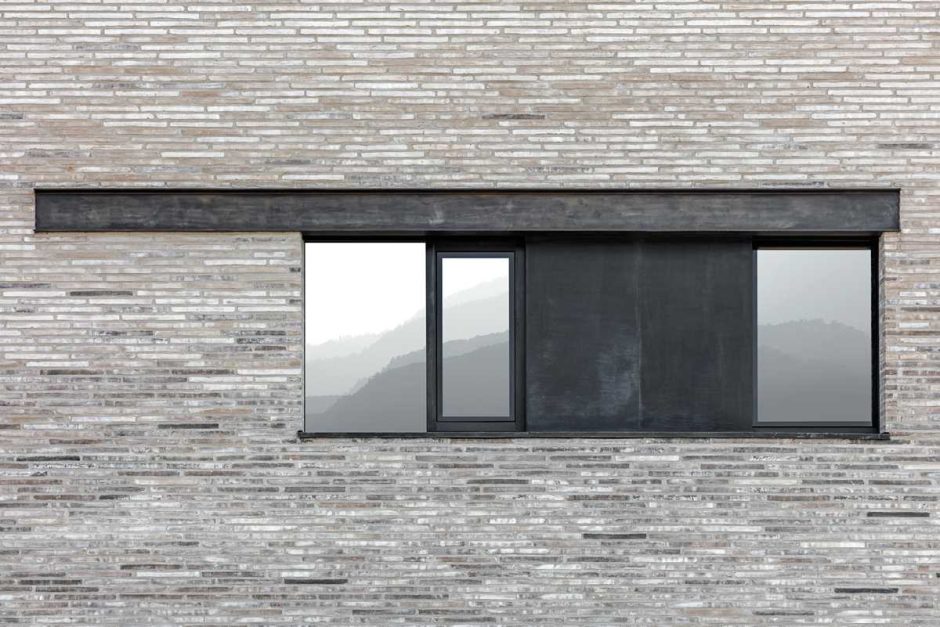Handmade Elongated Bricks Cover The Exterior Of This Home