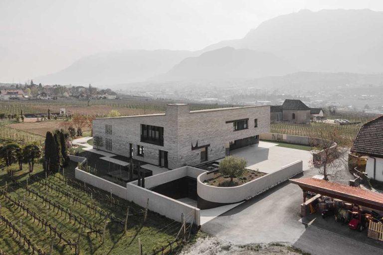 Handmade Elongated Bricks Cover The Exterior Of This Home