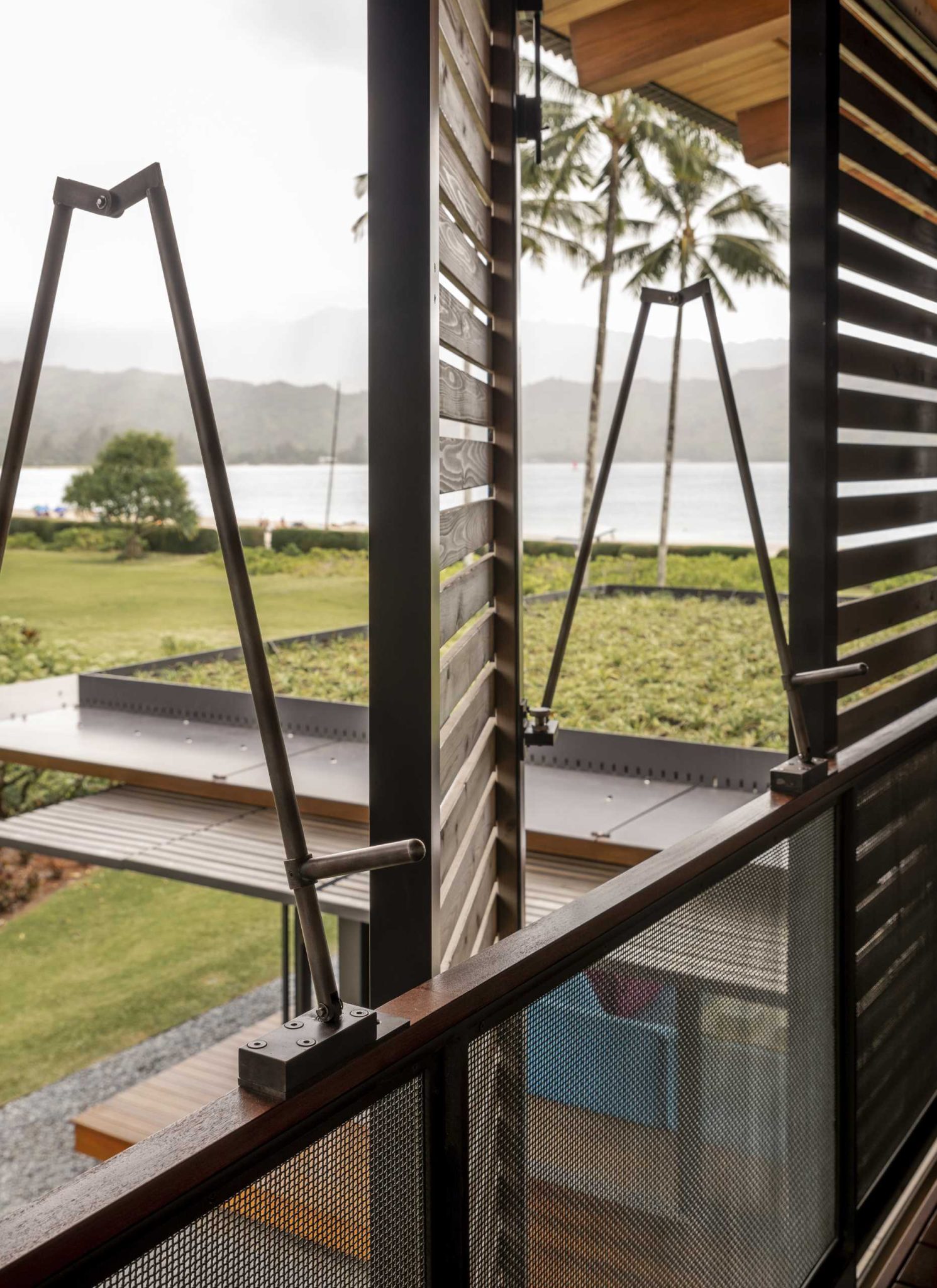 Operable Screens Cover The Exterior Of This Hawaiian Home