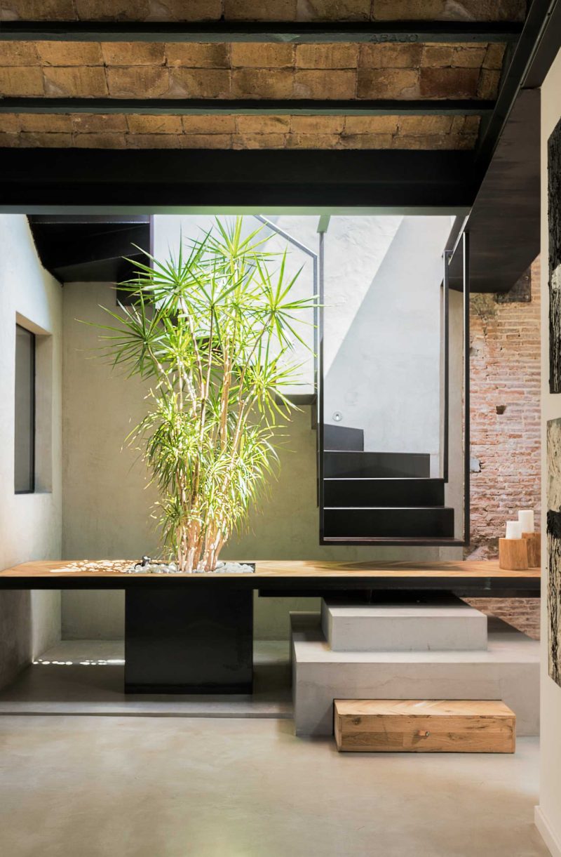 The Dining Table Becomes Part Of The Stairs Inside This Eclectic House