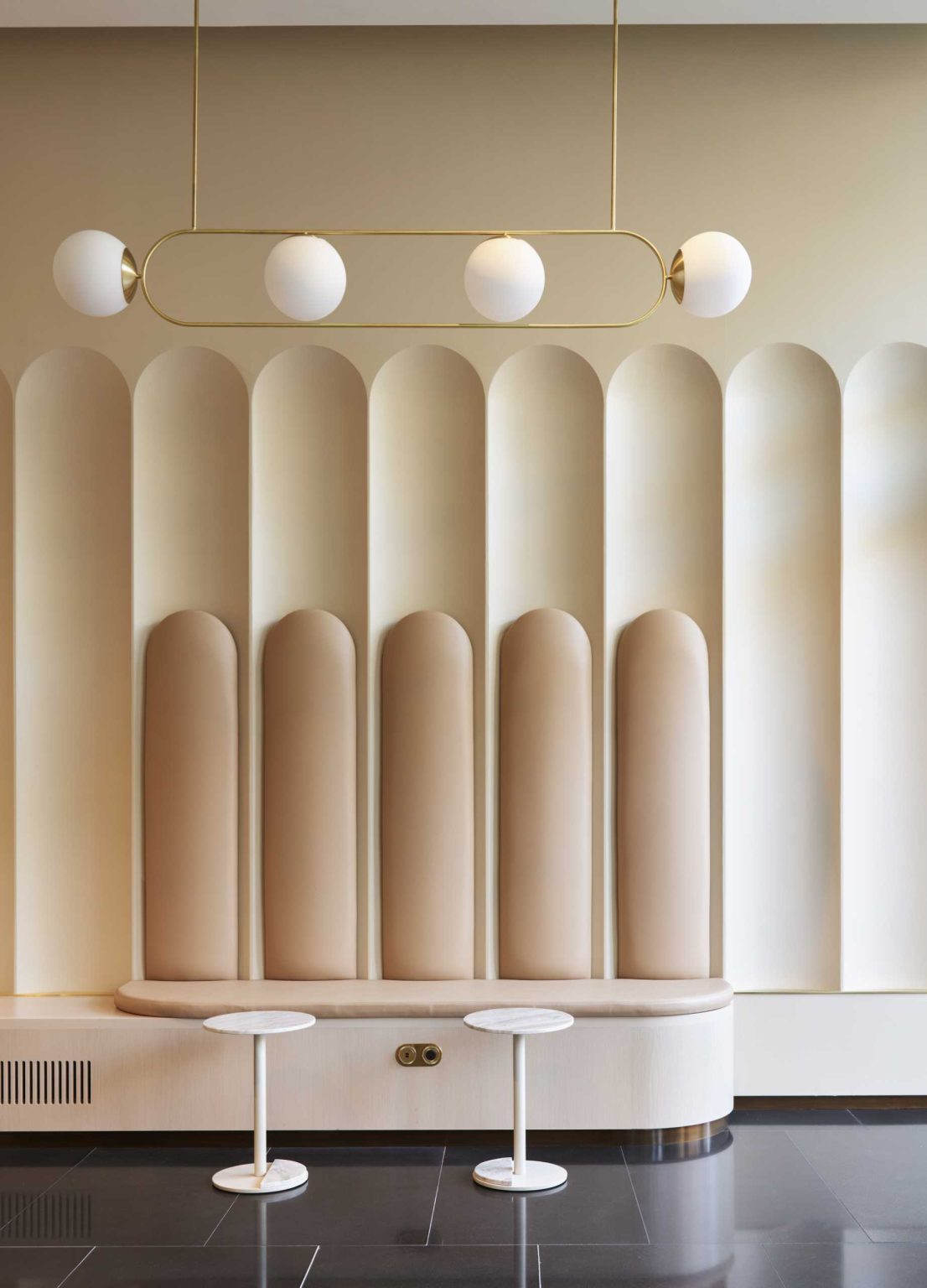 Arched Geometry Adds Personality To This Office Building Lobby