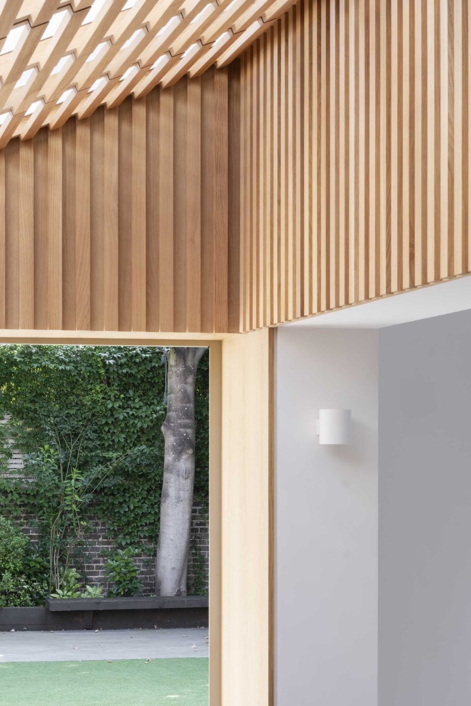 A Re-Imagined Side Extension With A Slatted Wood Design