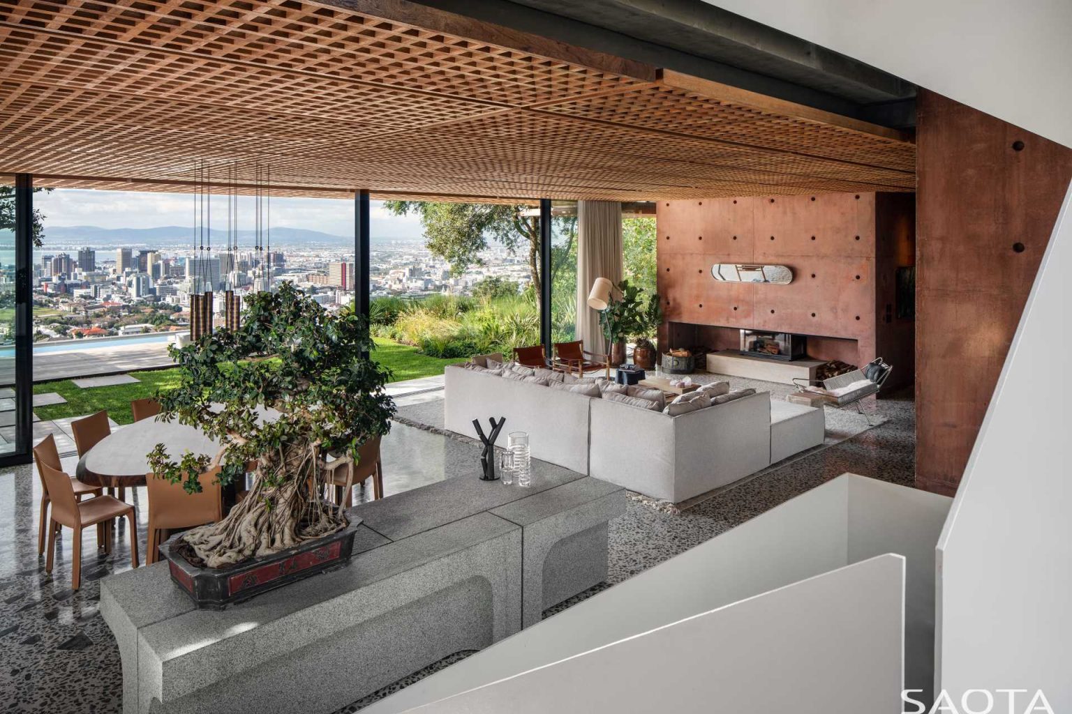 Red-Pigmented Concrete Screens Surround This New Home In Cape Town