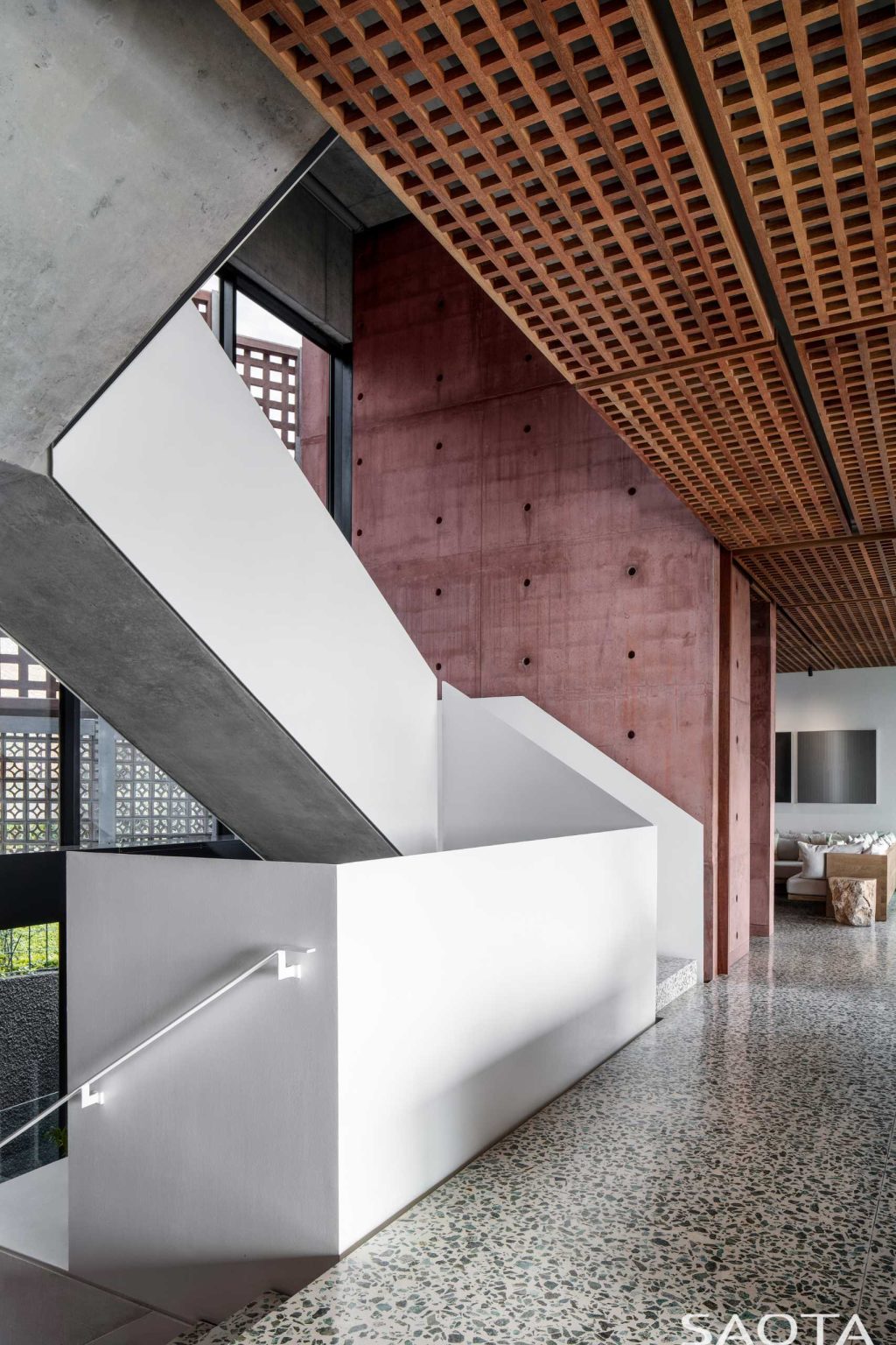 Red-Pigmented Concrete Screens Surround This New Home In Cape Town