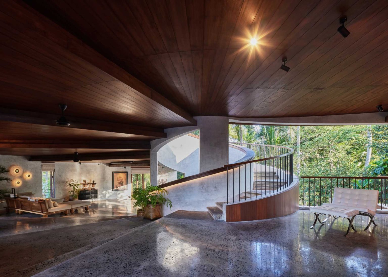 Two Spiral Staircases Help Create This Unique Home Design