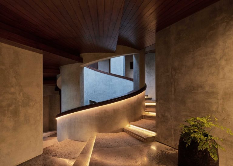 Two Spiral Staircases Help Create This Unique Home Design
