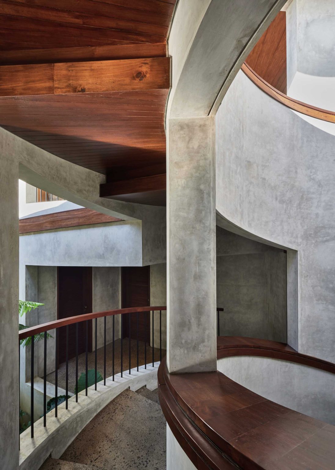 Two Spiral Staircases Help Create This Unique Home Design