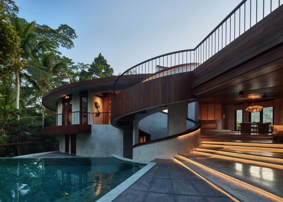 Two Spiral Staircases Help Create This Unique Home Design