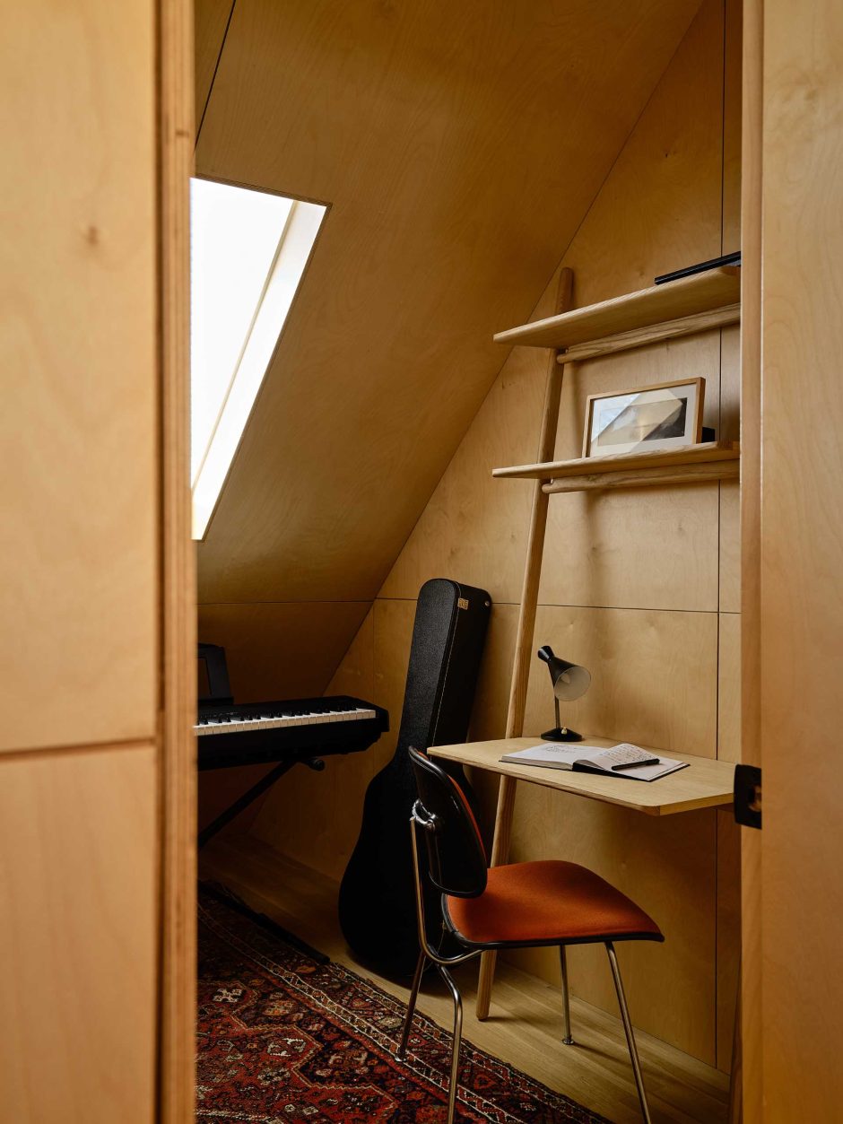 A Sheltered Space Beneath The Sloping Roof Of This Home Makes Space For ...