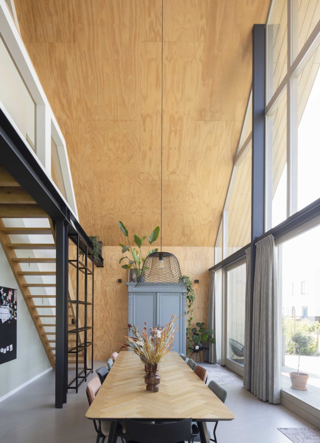 This Barn-Inspired Home Hides A Playroom With Climbing Wall Under Its ...