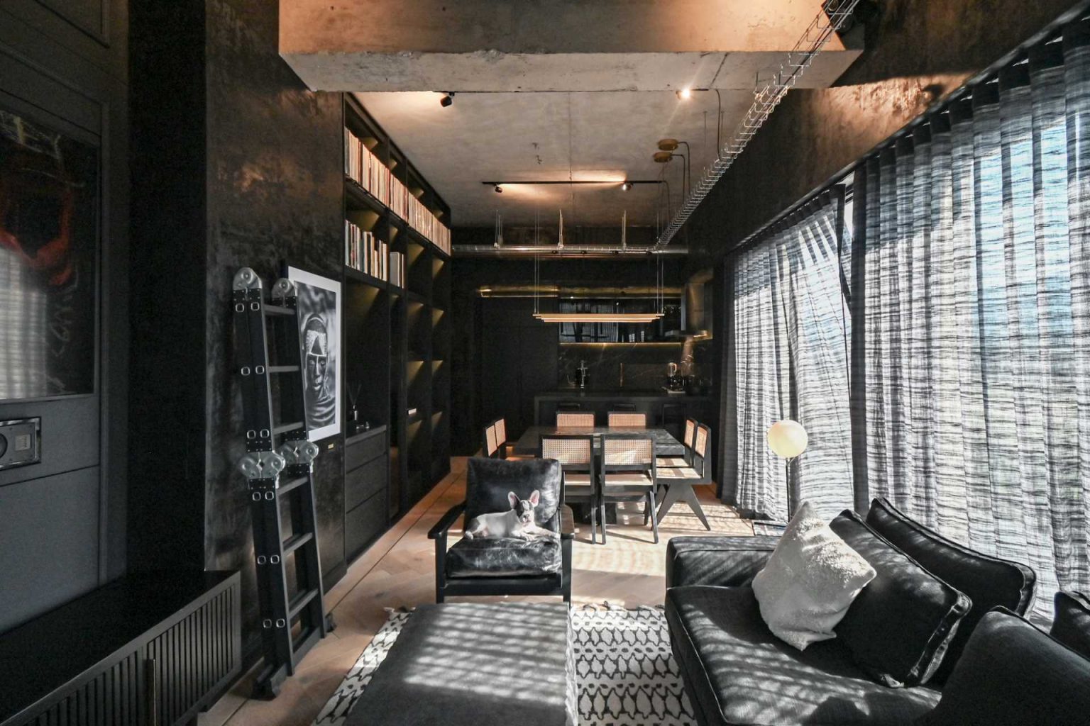 A Black Interior Gives This Apartment A Dark And Dramatic Appearance