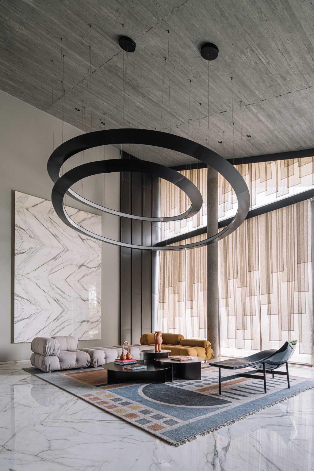 A Curving Bridge Leads To The Entertainment Areas Of This Modern Home