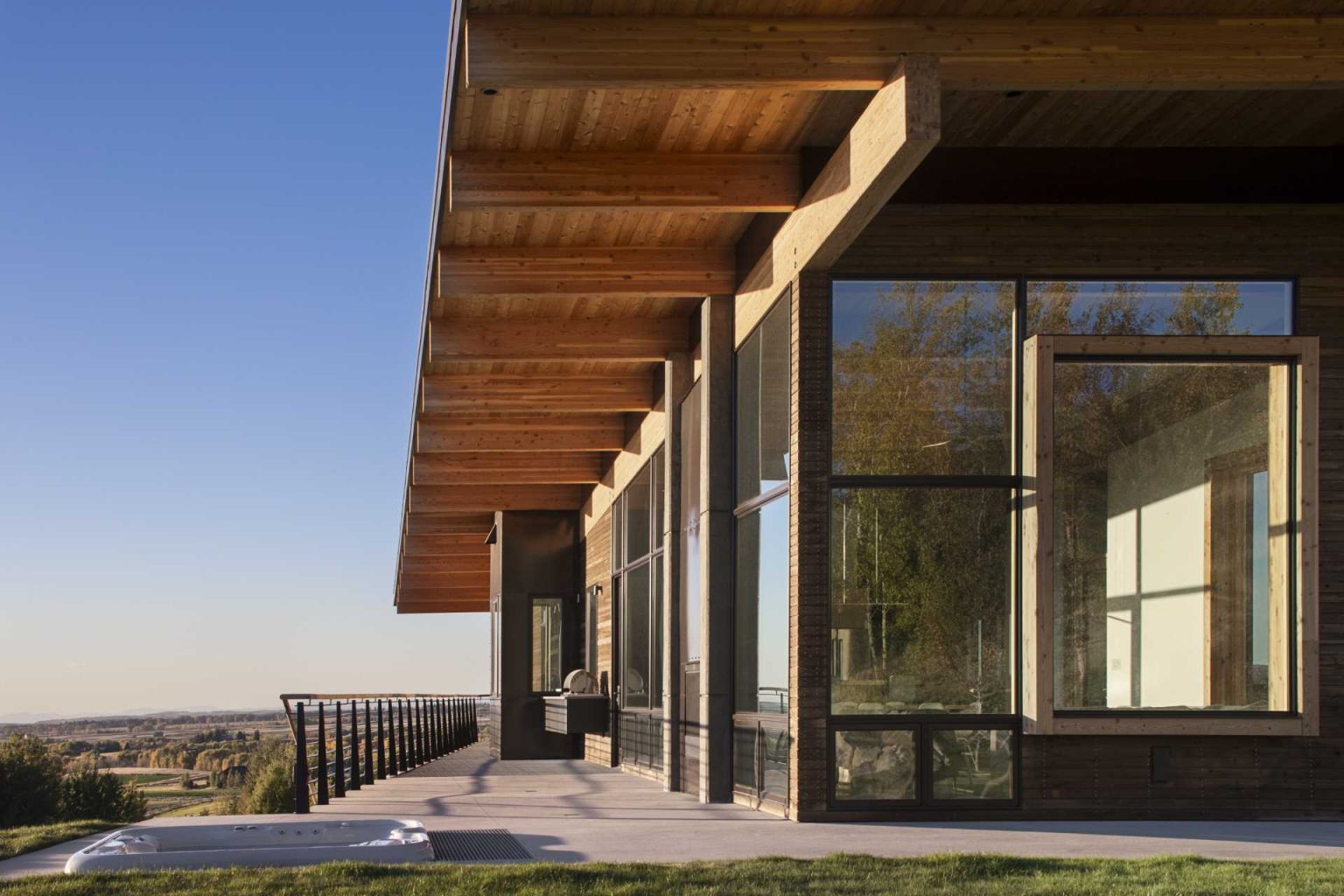 Exterior Lighting Shows Off The Post And Beam Structure Of This Home