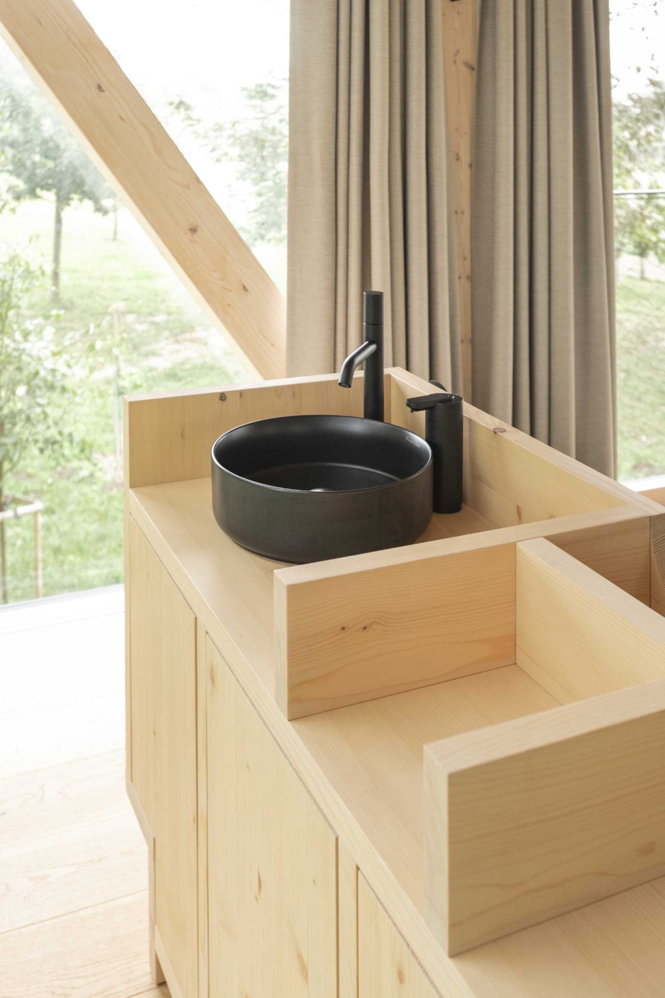 A Small Elevated Cabin Inspired By A Bird's Nest