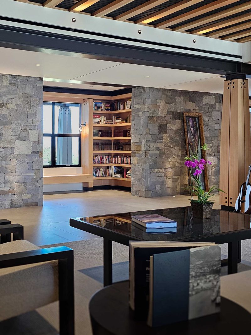 Steel, Wood, And Stone Are On Display Inside This Hillside Home