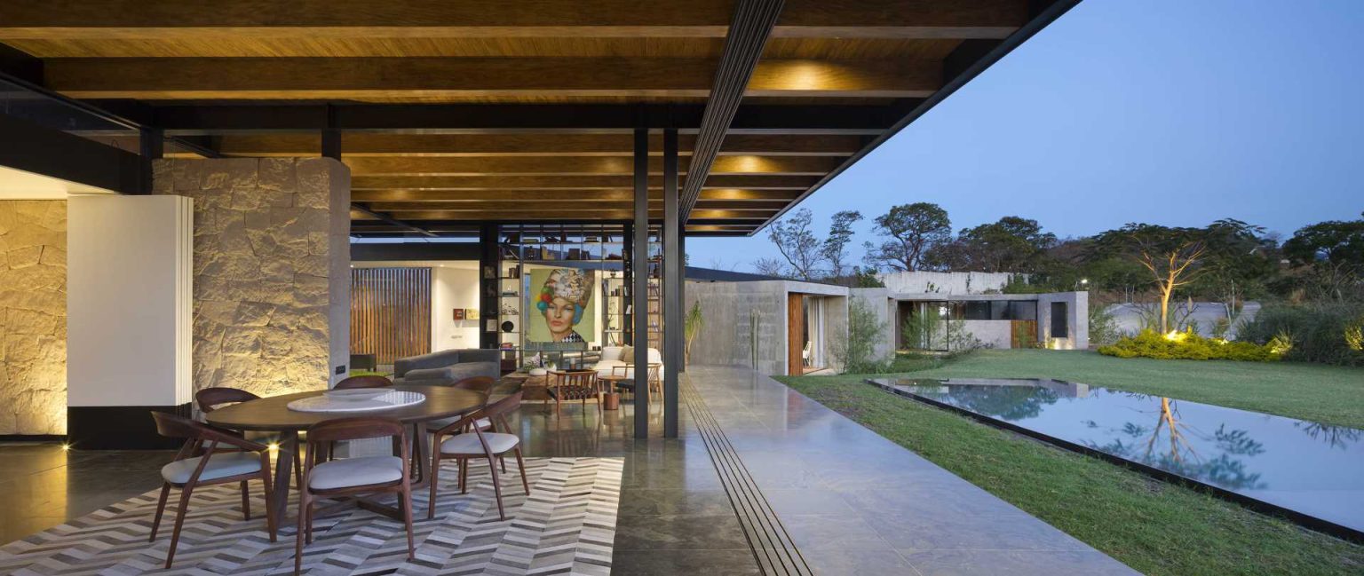The Exposed Wood Ceiling Of This Home Shows Off Its Structure