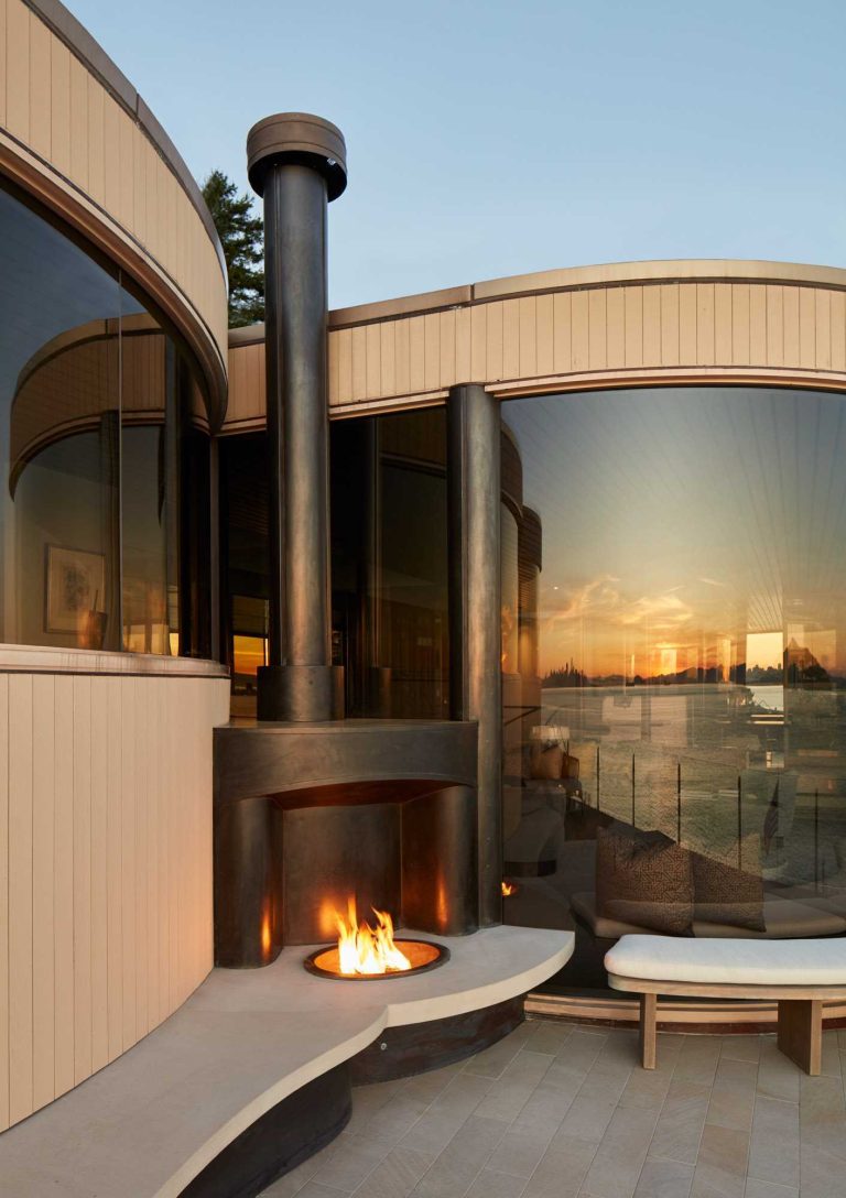 Curved Windows Allow This Home To Have Unobstructed Water Views