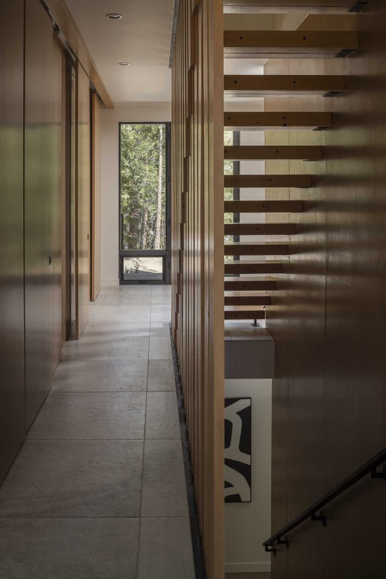 Dark Vertical Wood Siding Was Chosen As The Primary Exterior Cladding ...