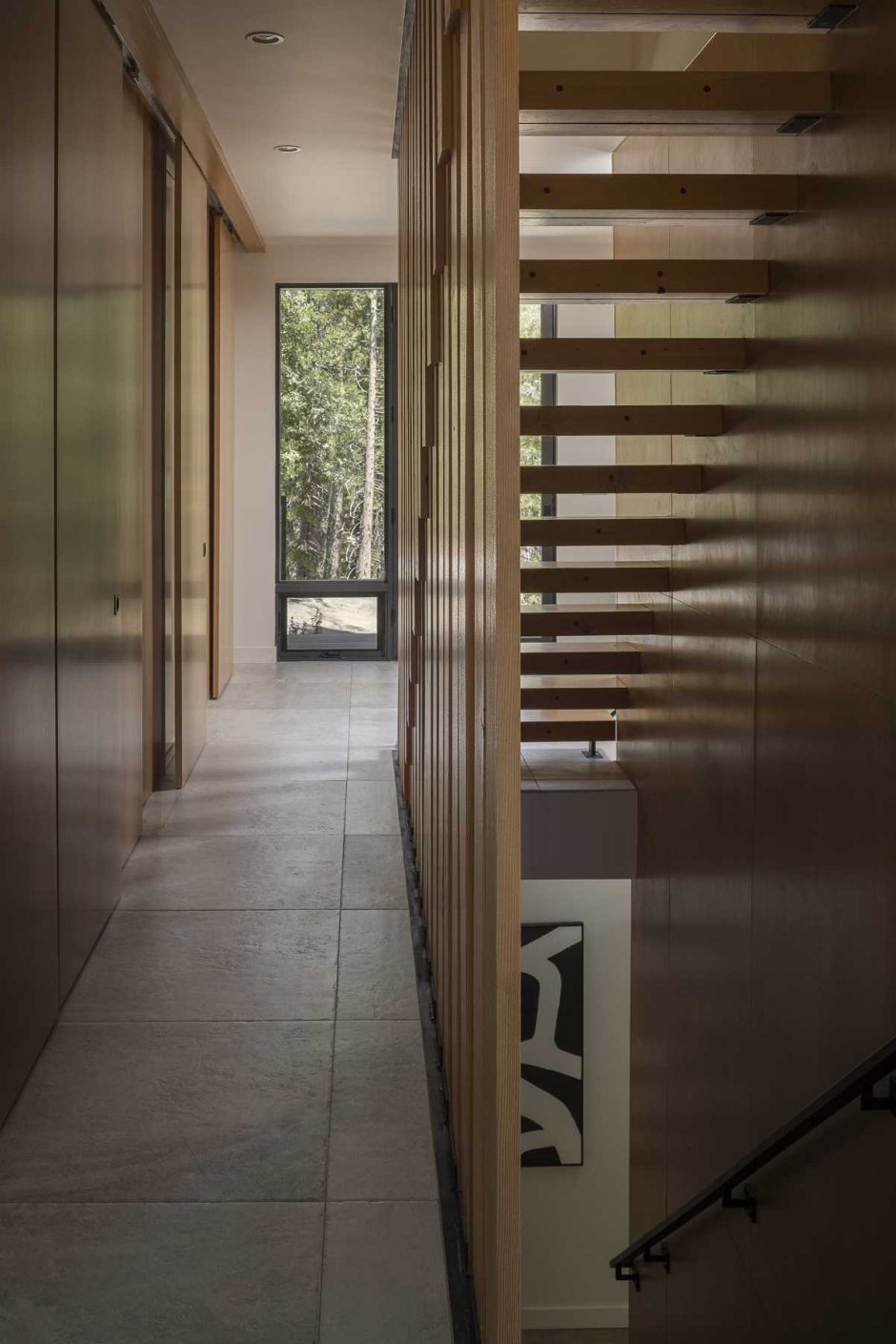 Dark Vertical Wood Siding Was Chosen As The Primary Exterior Cladding ...