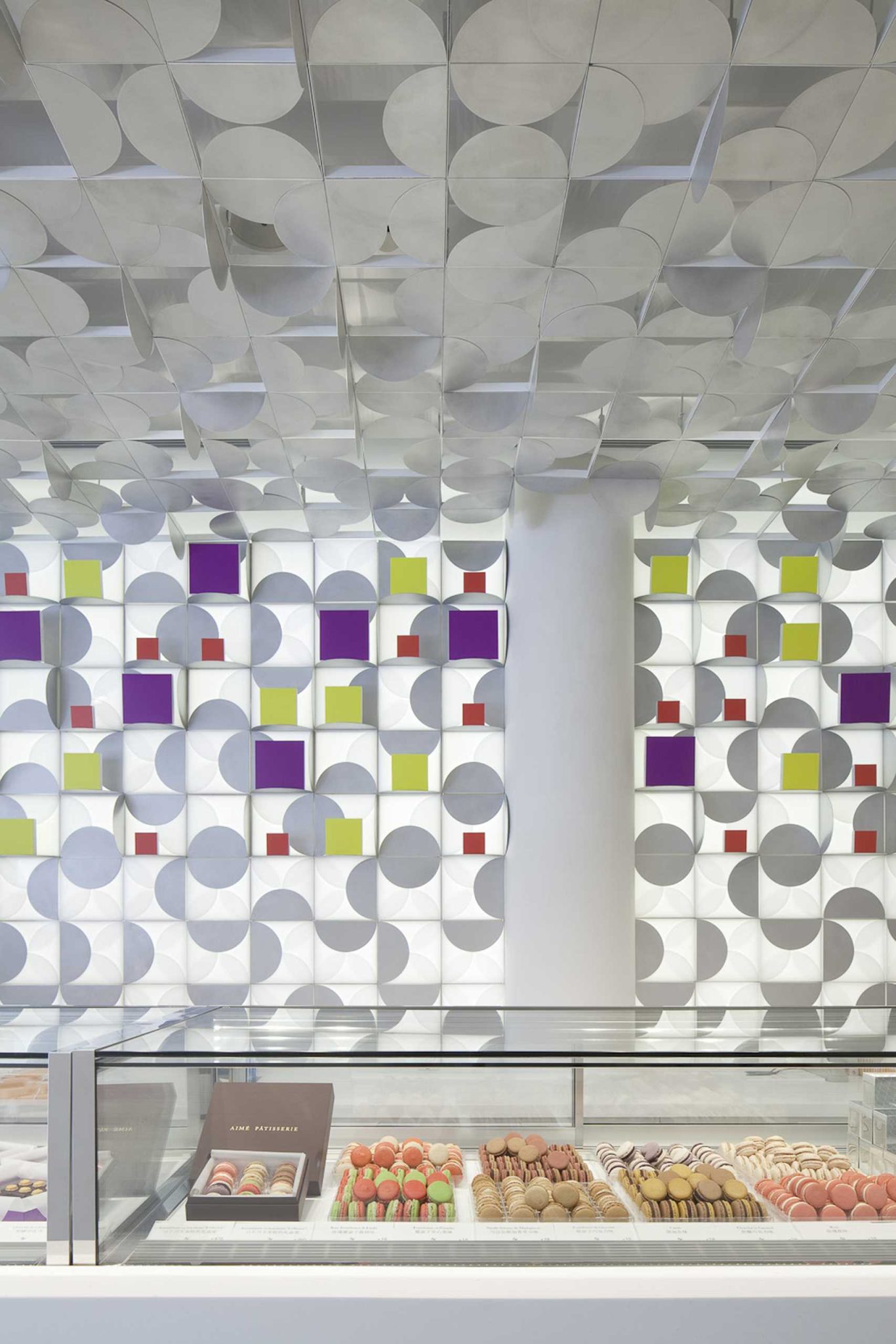 The Design Of This Modern White Patisserie Stands Out From Its Neighbors