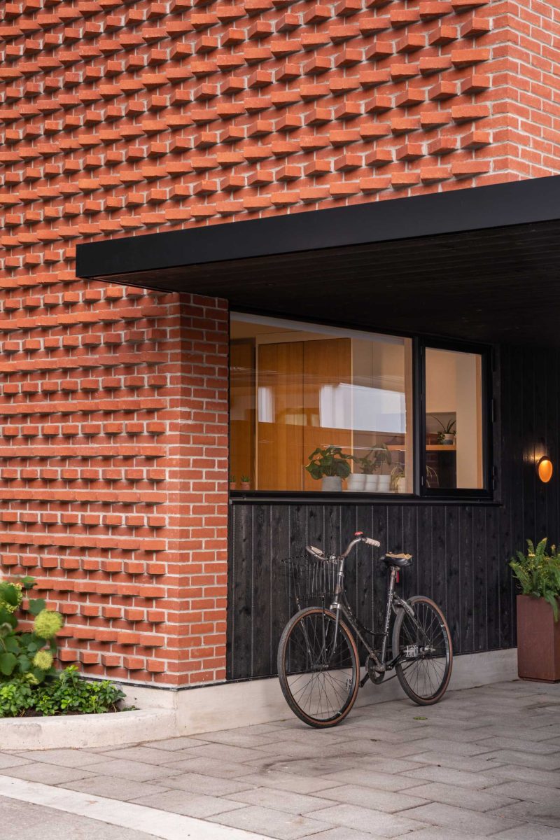 A Laneway House With A Rotated Brick Facade