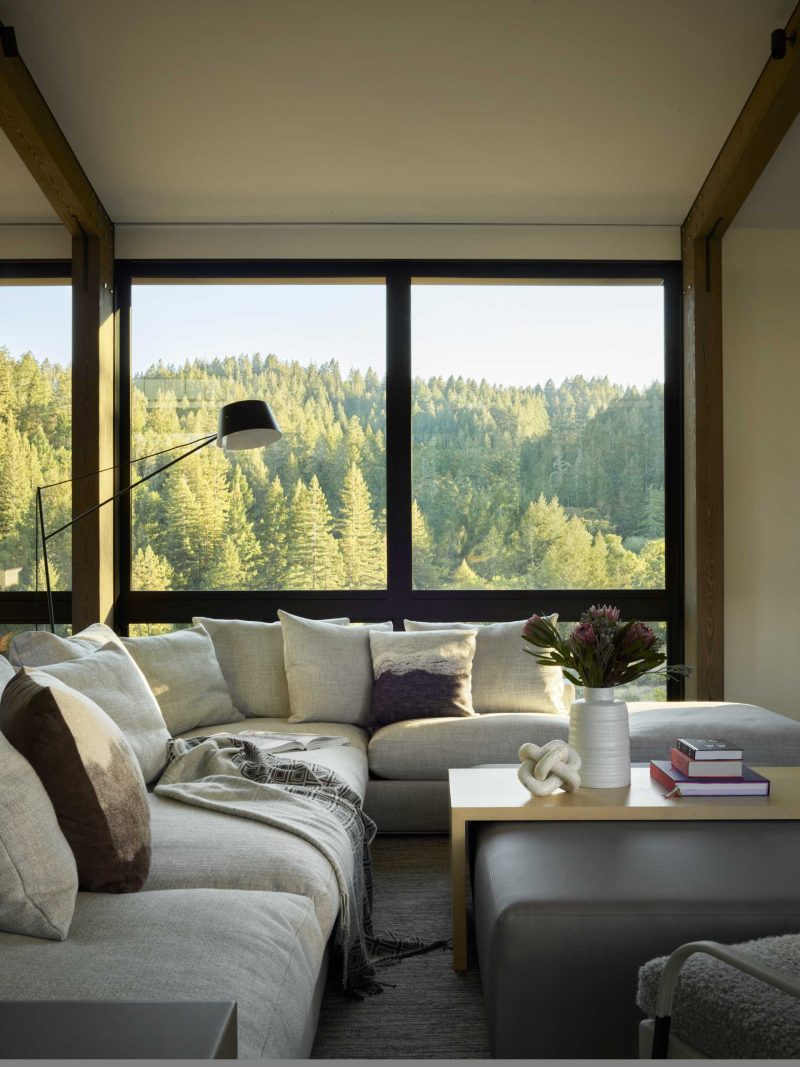 The Post And Beam Structure Is On Display Inside This New Home