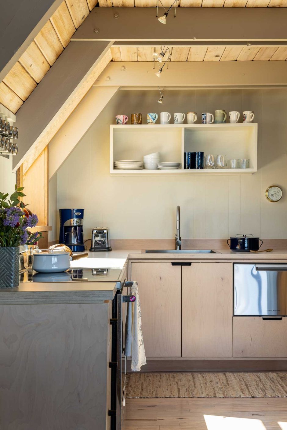 A Waterfront A-frame House Renovated With Contemporary Finishes