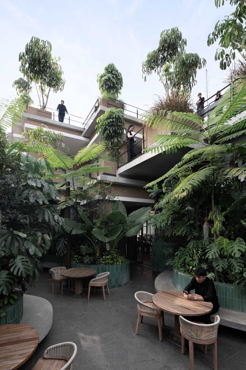 This Building With A Split Roof Makes Space For A Rooftop Park