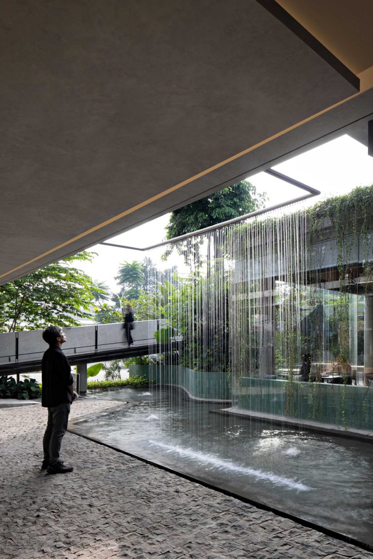 This Building With A Split Roof Makes Space For A Rooftop Park