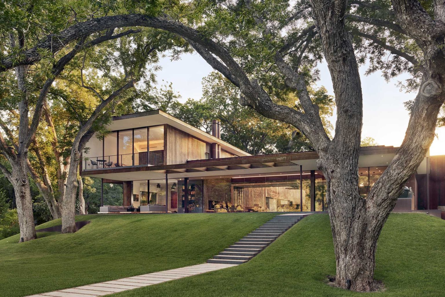 Weathered Steel Covers The Exterior Of This Modern Home In Texas