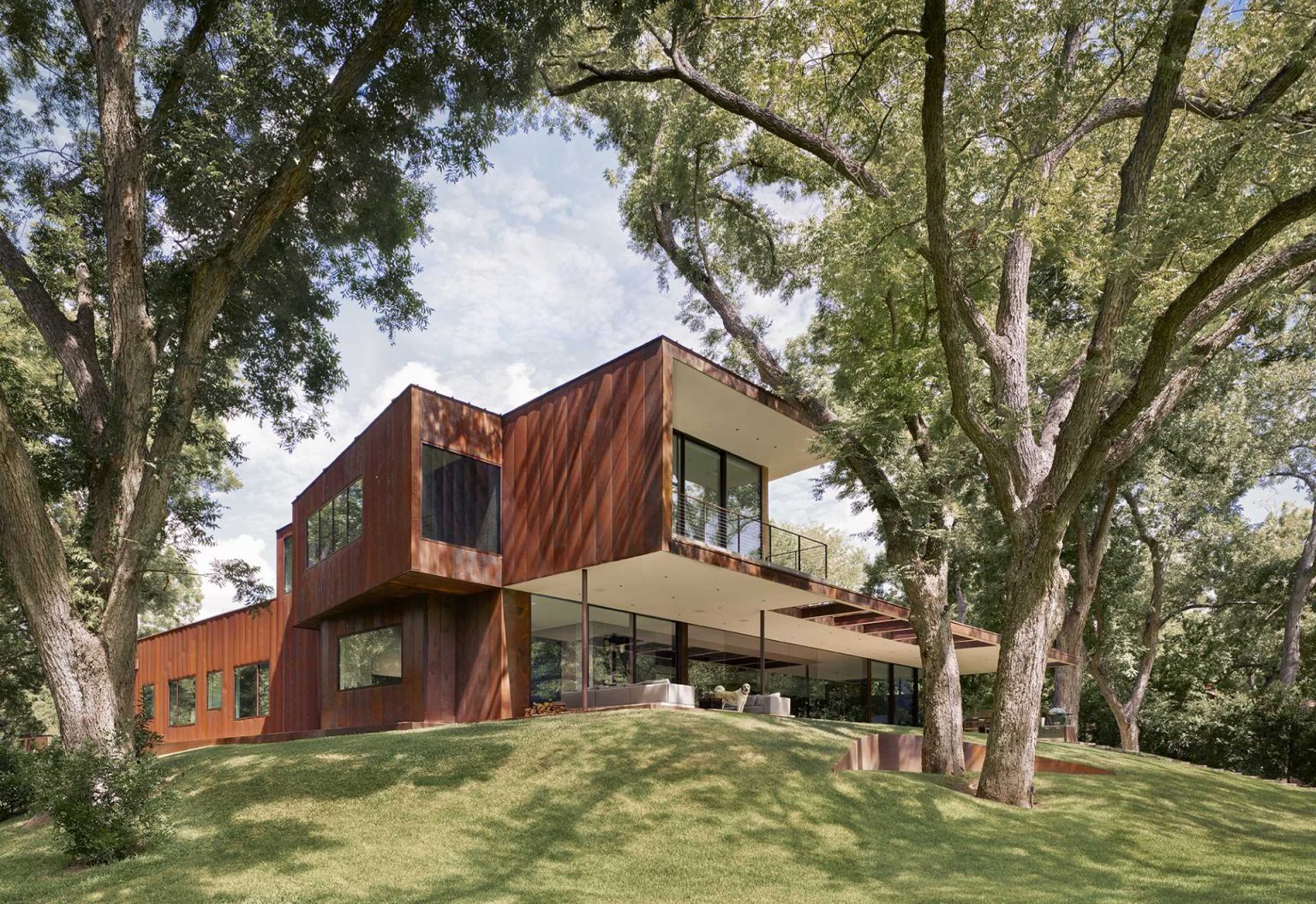 Weathered Steel Covers The Exterior Of This Modern Home In Texas