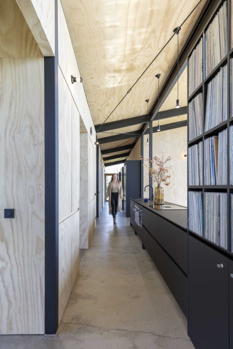 An Extended Sloped Roof Runs The Length Of This Modern Home