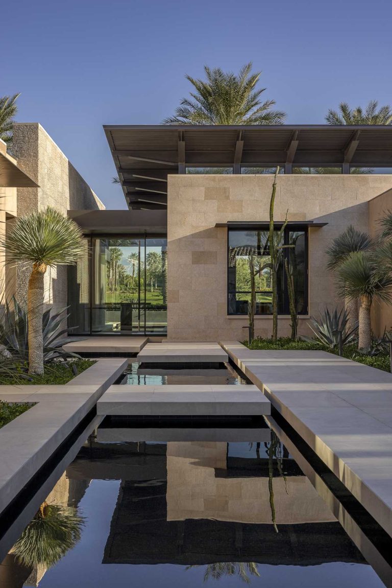 Reflecting Ponds And Concrete Lily Pads Help Create Tranquility At This ...