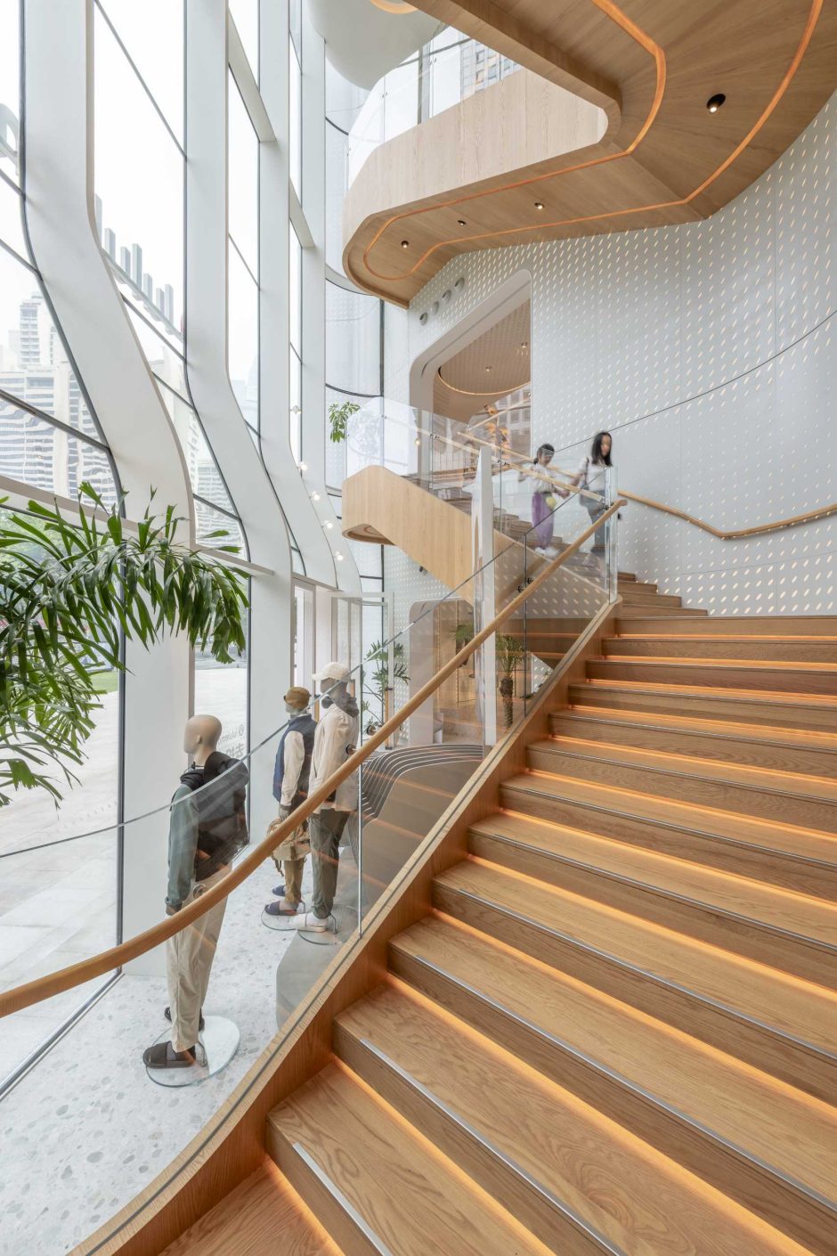 A Colossal Curved Glass Window Shows Off The Biggest LULULEMON Flagship ...